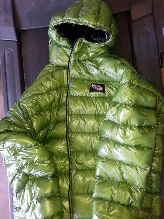 Hooded vs. hoodless puffies - Backpacking Light